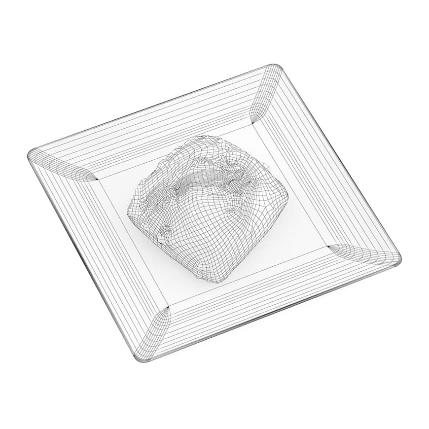 Dark Bun on White Plate